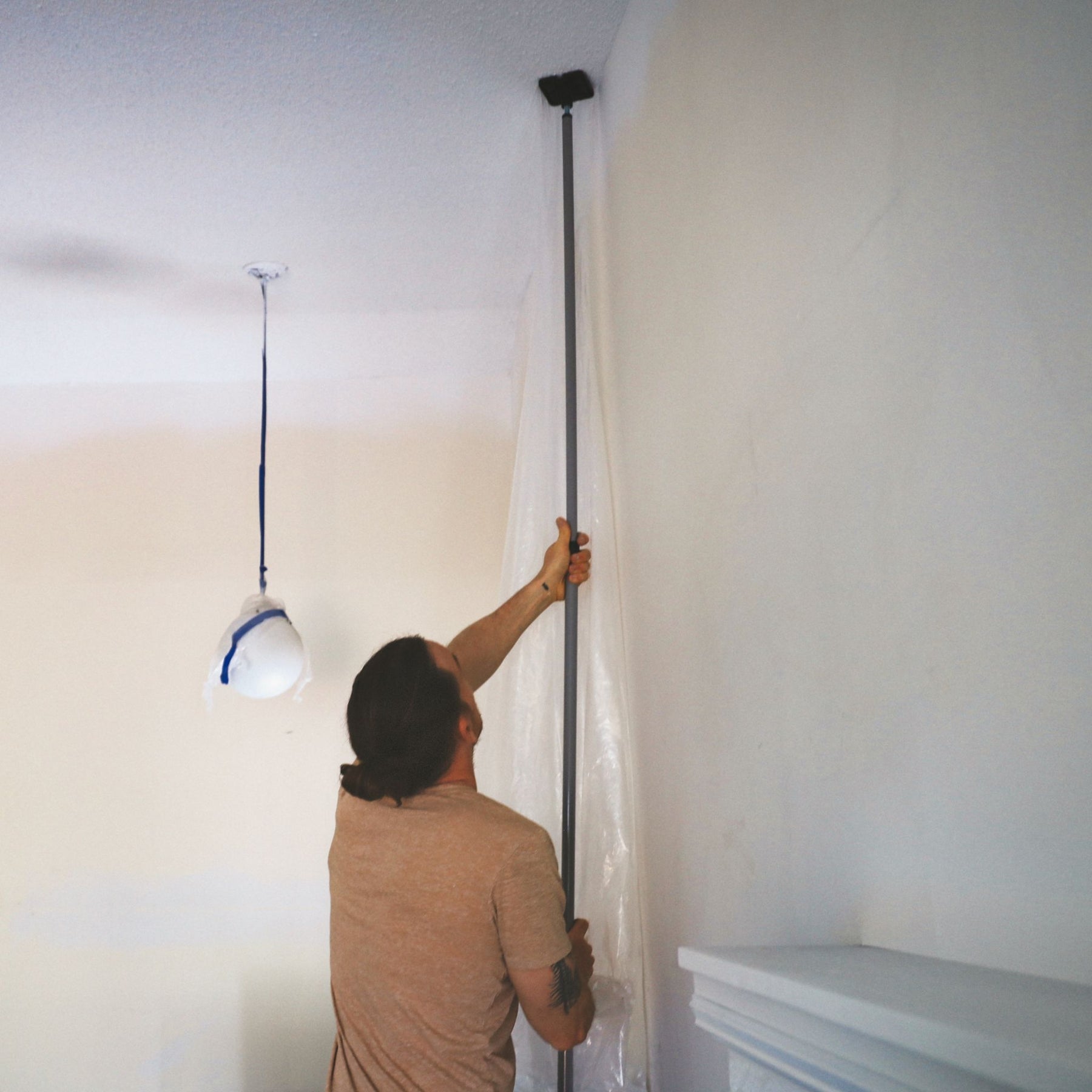 Adjustable Dust Barrier Poles for Clean Work Areas – DIY Painting Supply